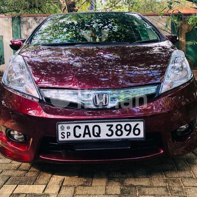 Honda Fit Shuttle Maroon (GP-2) 2013 for Sale in Galle City | ikman