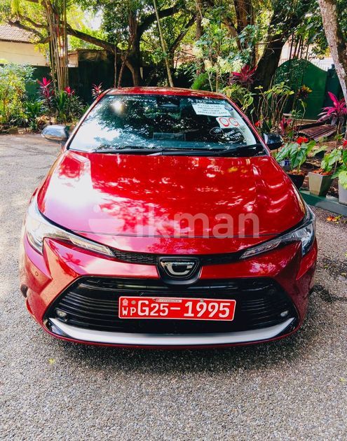 Toyota Corolla WXB Wine RED 2023 විකිණීමට | ගම්පහ නගරය | ikman